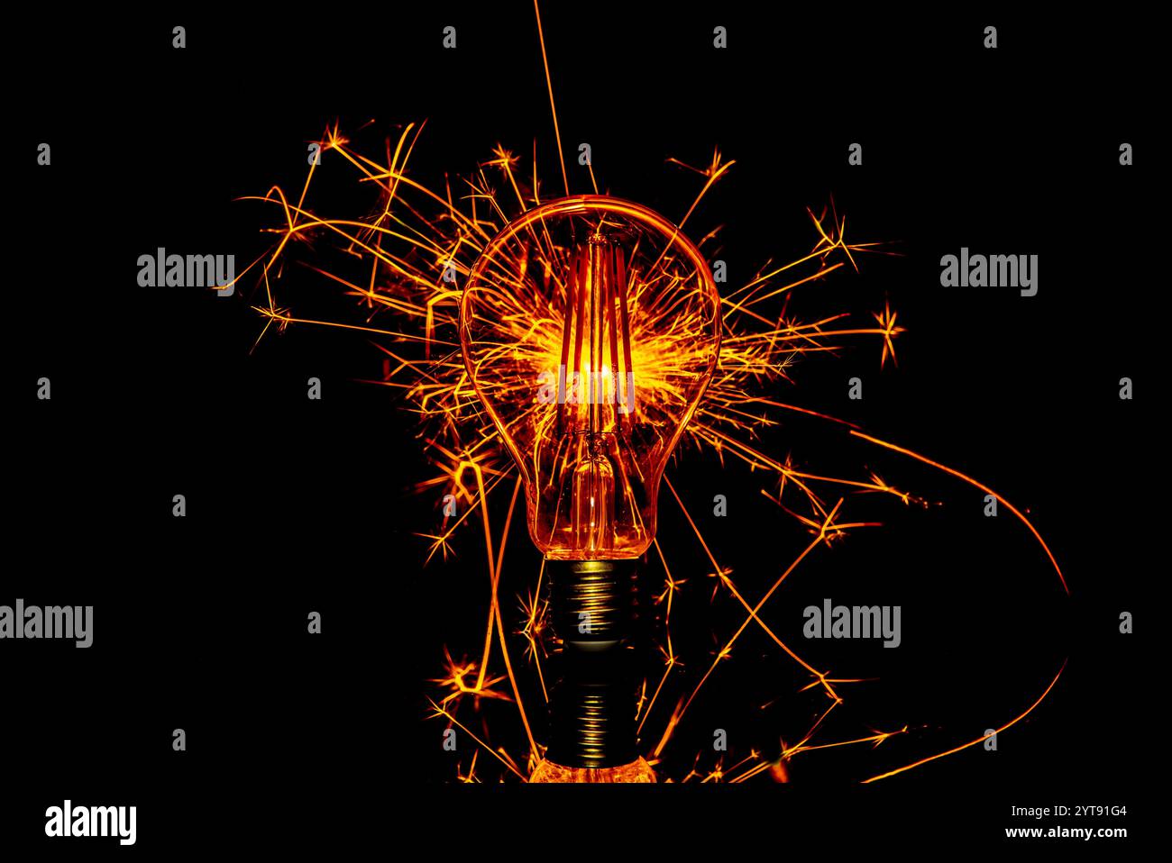 Light painting with light bulb and burning sparkler Stock Photo - Alamy
