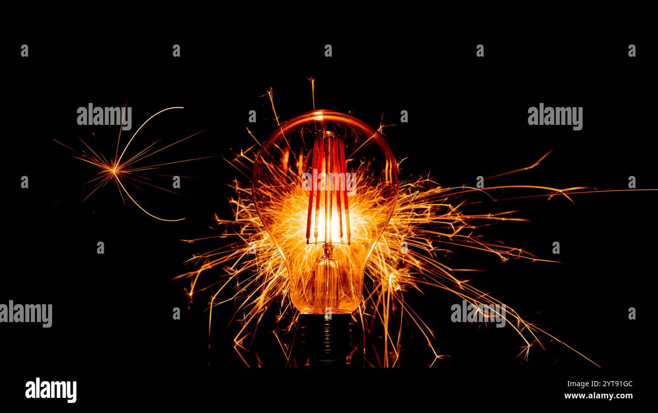 Light painting with light bulb and burning sparkler Stock Photo - Alamy
