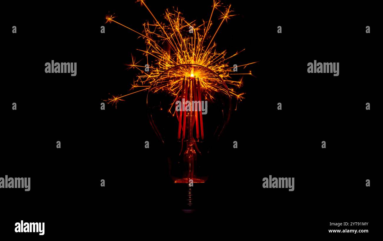Light painting with light bulb and burning sparkler Stock Photo - Alamy
