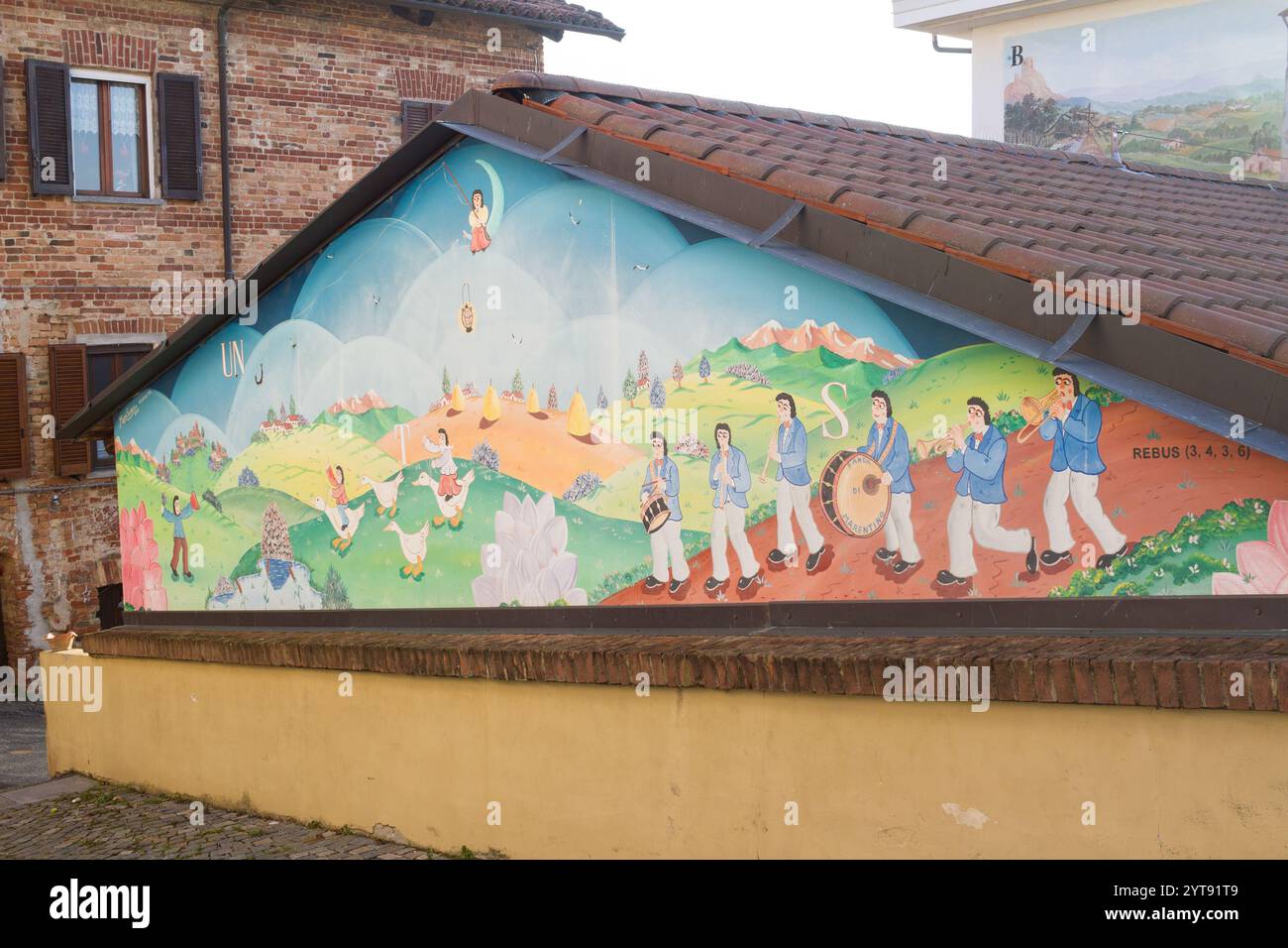 Mural with riddles drawn on the wall in Marentino, Italian village in ...