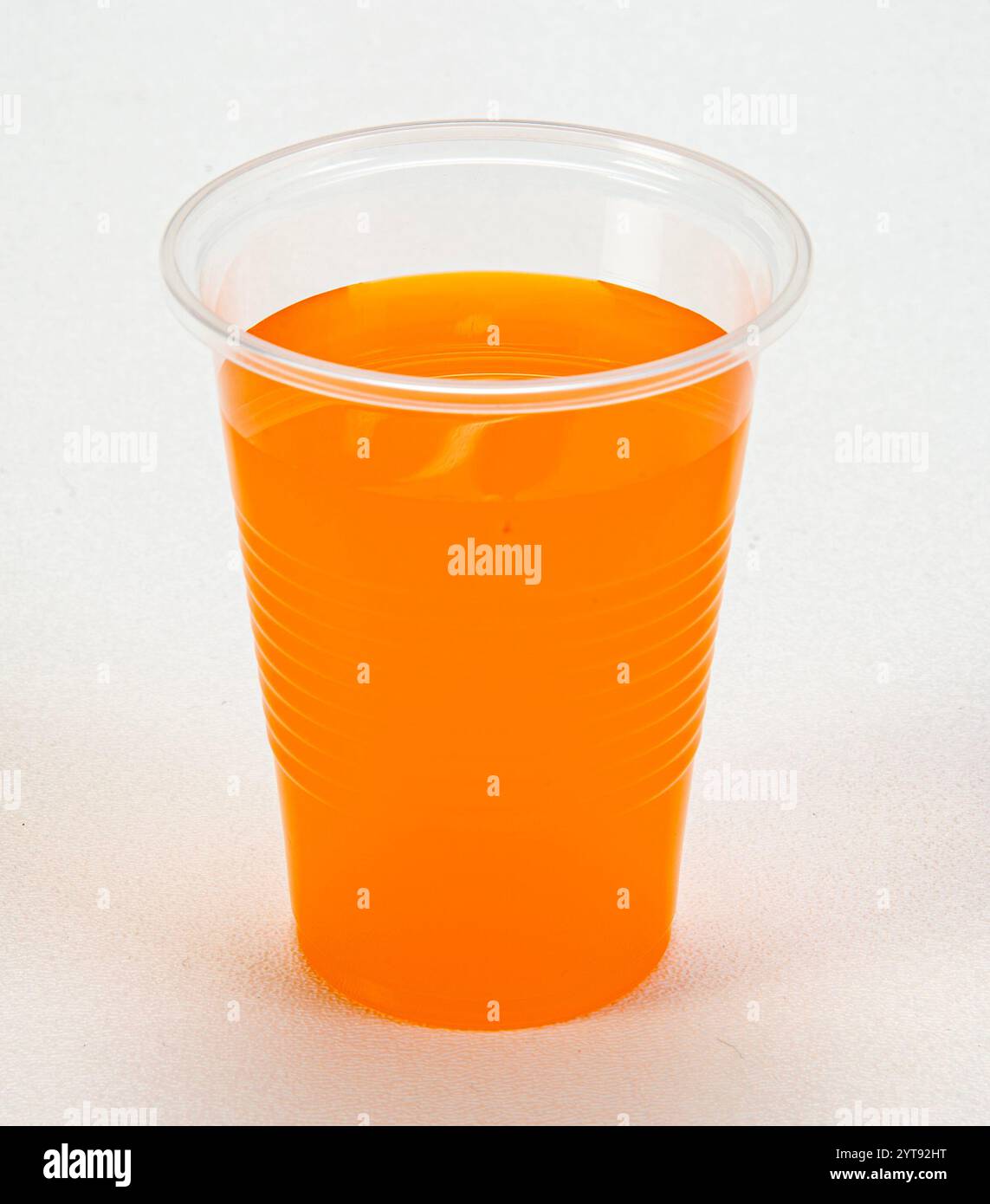 Clear plastic cup with soda beverage Stock Photo - Alamy