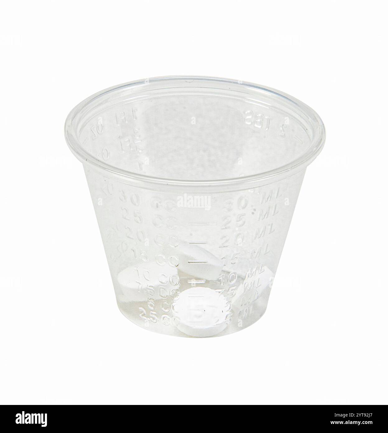 Small empty plastic cup Stock Photo - Alamy