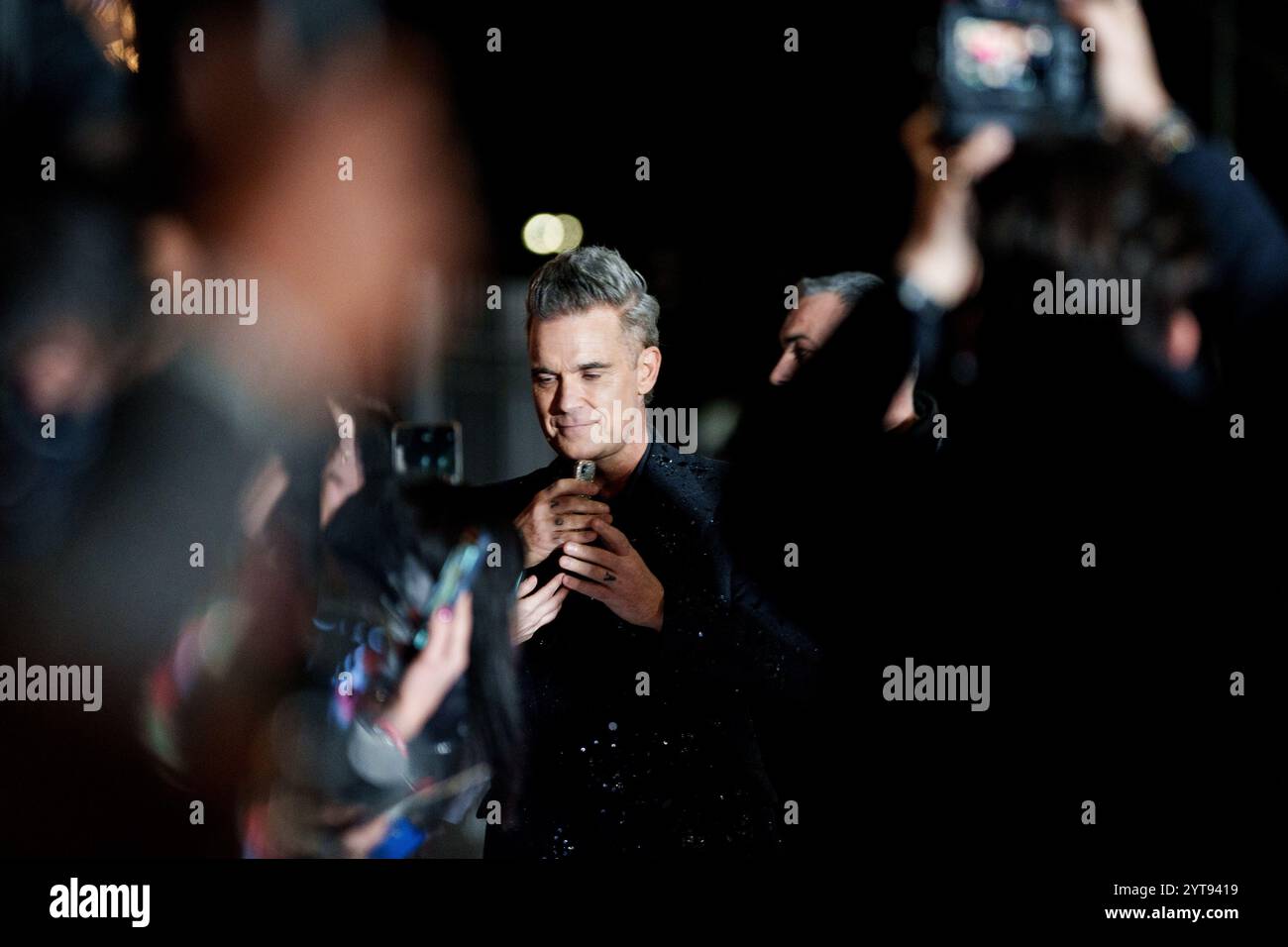 ROME, ITALY - Robbie Williams and Michael Gracey attend the premiere of ...