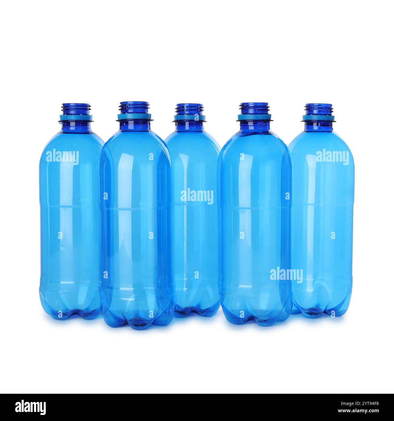 Many empty plastic bottles isolated on white Stock Photo - Alamy