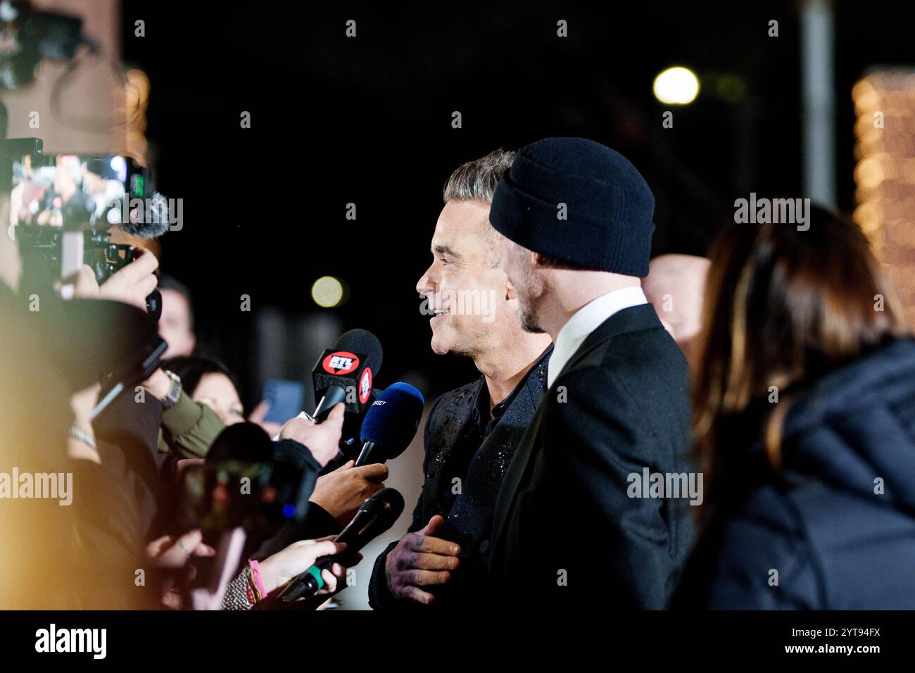 ROME, ITALY - Robbie Williams and Michael Gracey attend the premiere of ...
