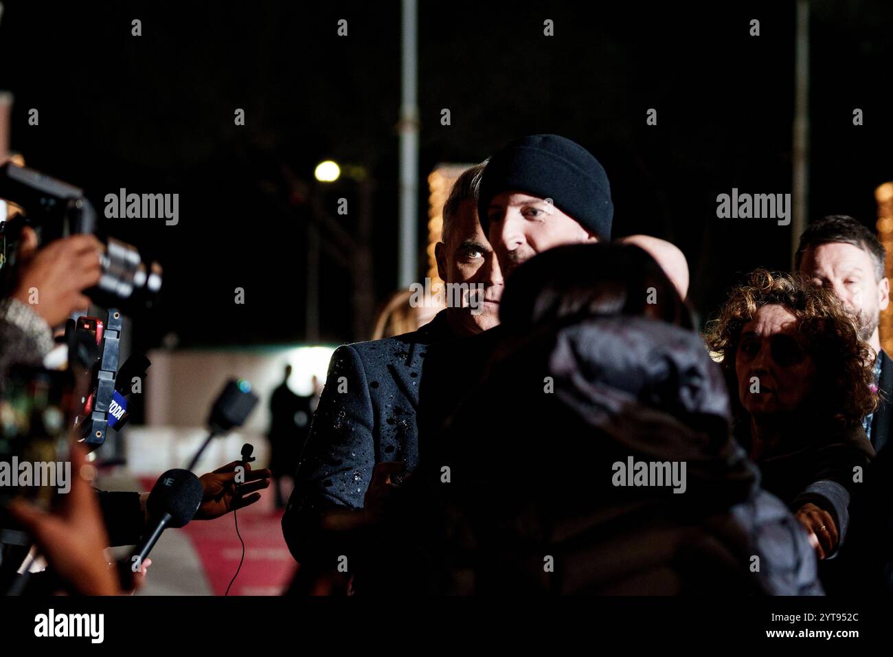 ROME, ITALY - Robbie Williams and Michael Gracey attend the premiere of ...