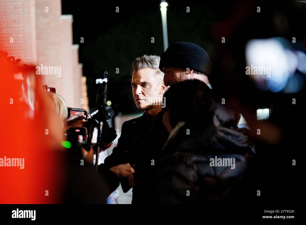 ROME, ITALY - Robbie Williams and Michael Gracey attend the premiere of ...