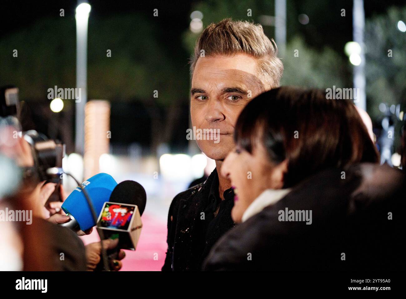 ROME, ITALY - Robbie Williams and Michael Gracey attend the premiere of ...