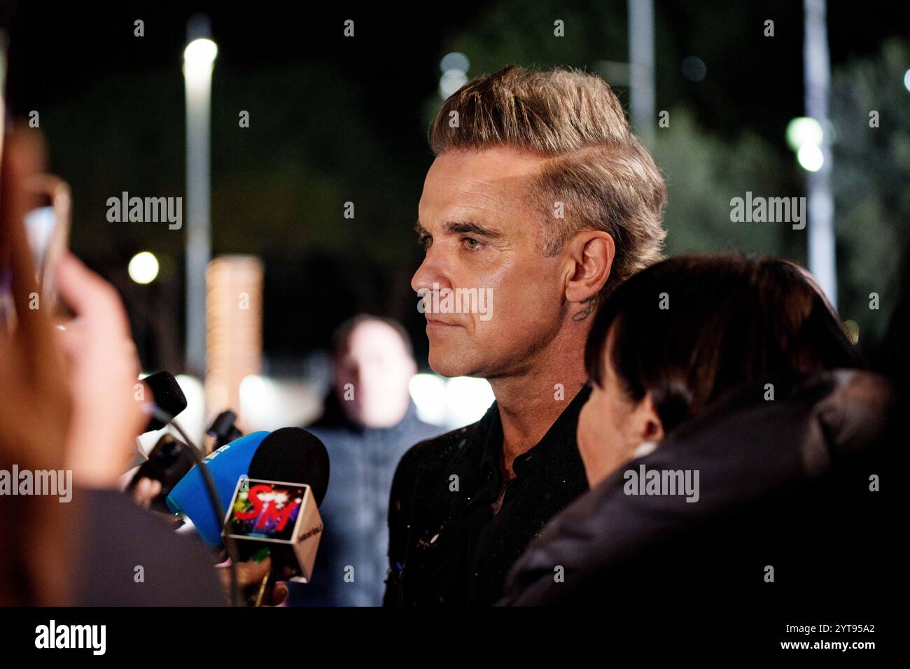 ROME, ITALY - Robbie Williams and Michael Gracey attend the premiere of ...
