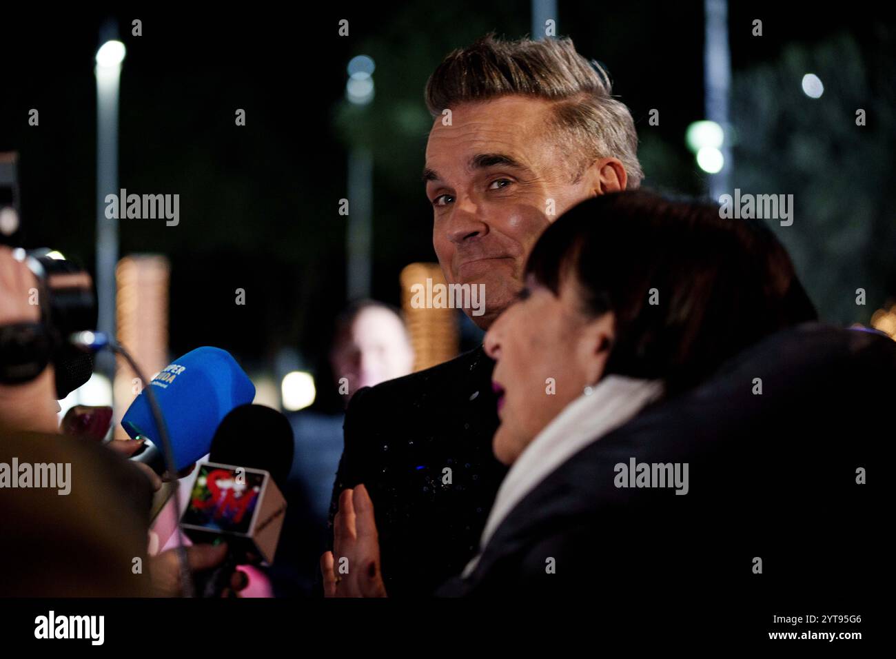 ROME, ITALY - Robbie Williams and Michael Gracey attend the premiere of ...