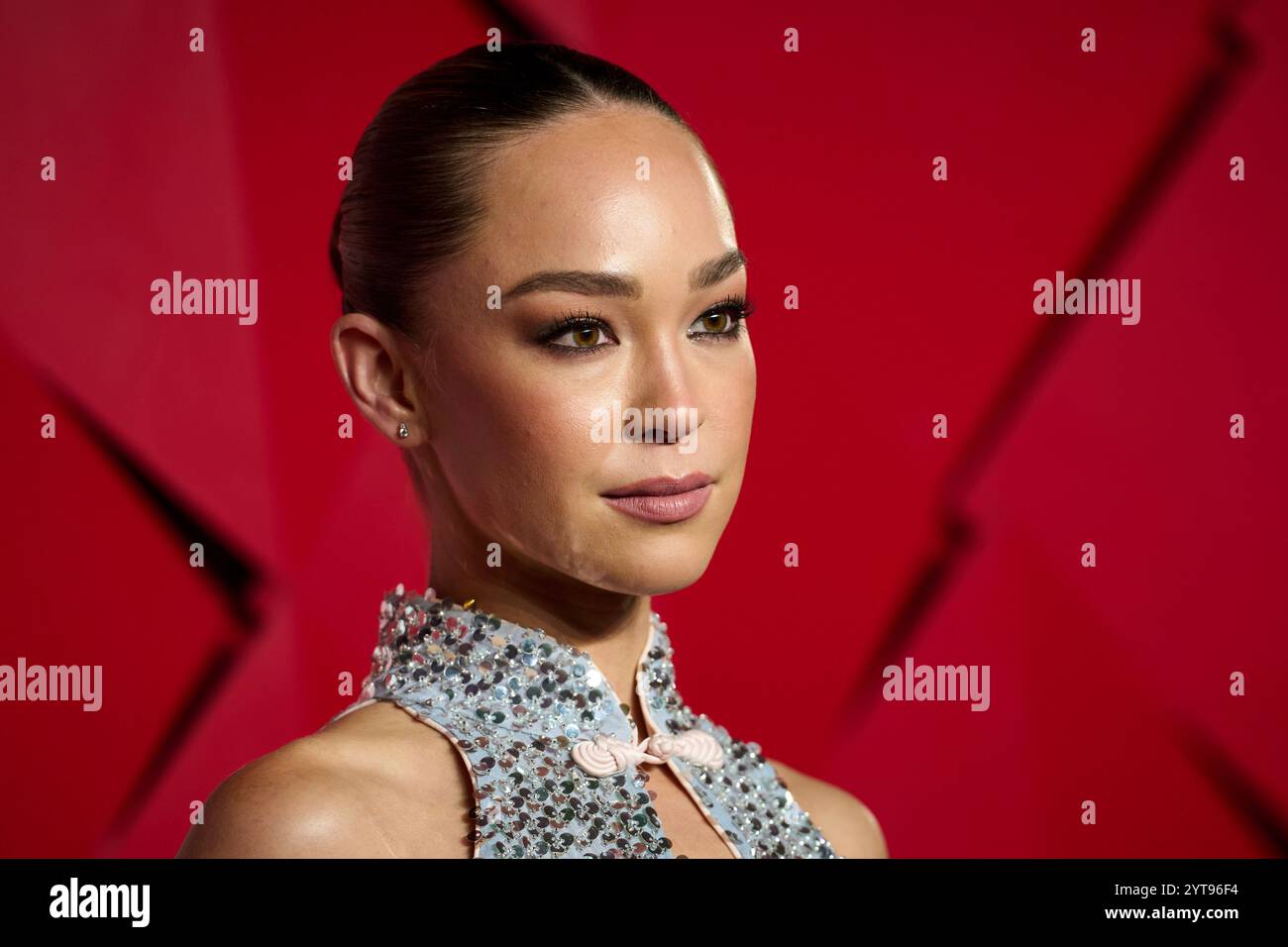 Naomi J. Ogawa poses for photographers upon arrival at The Fashion ...