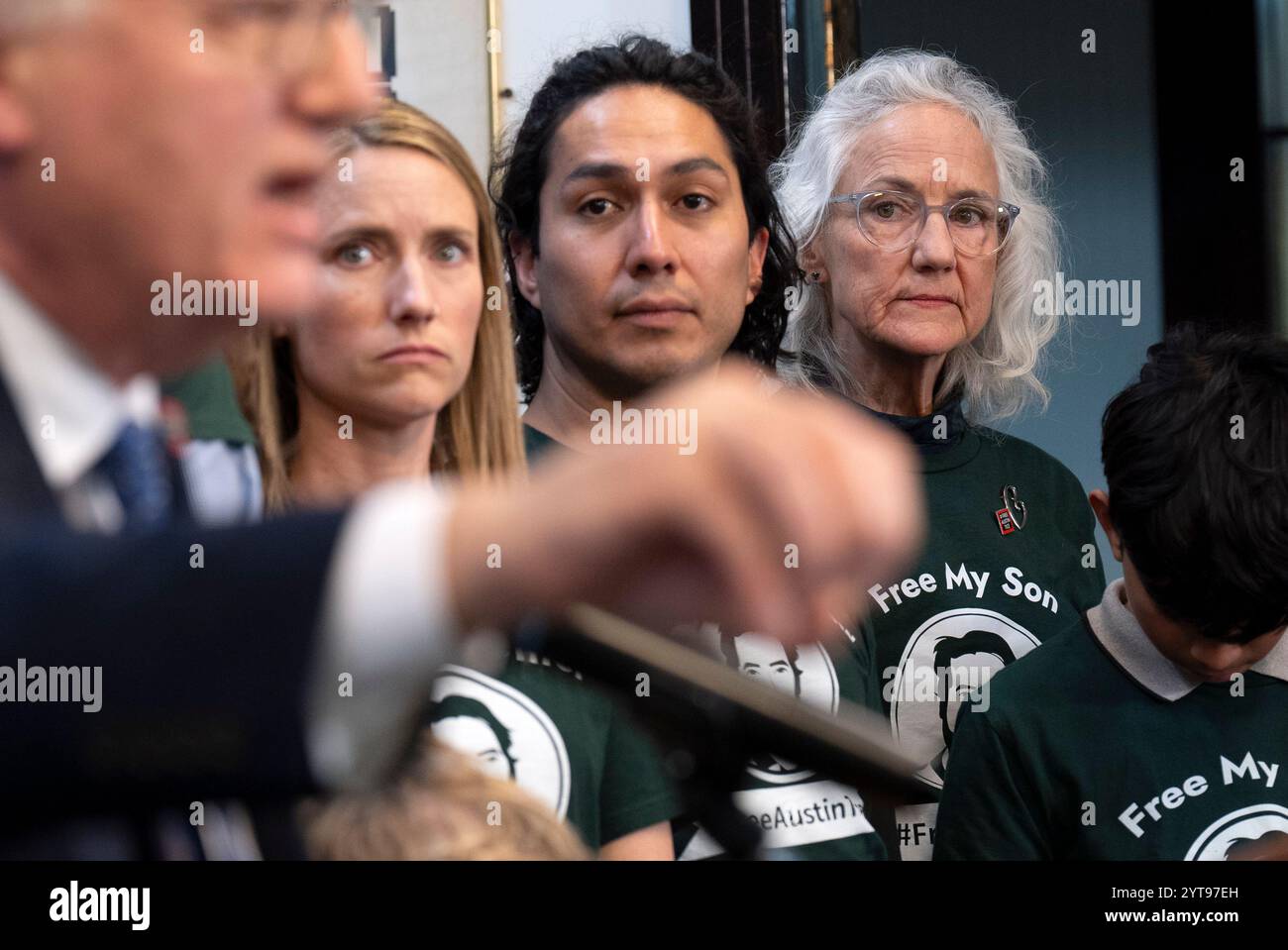 Abby Edaburn, from left, Charlie Tice-Zelaya and Debra Tice listen ...