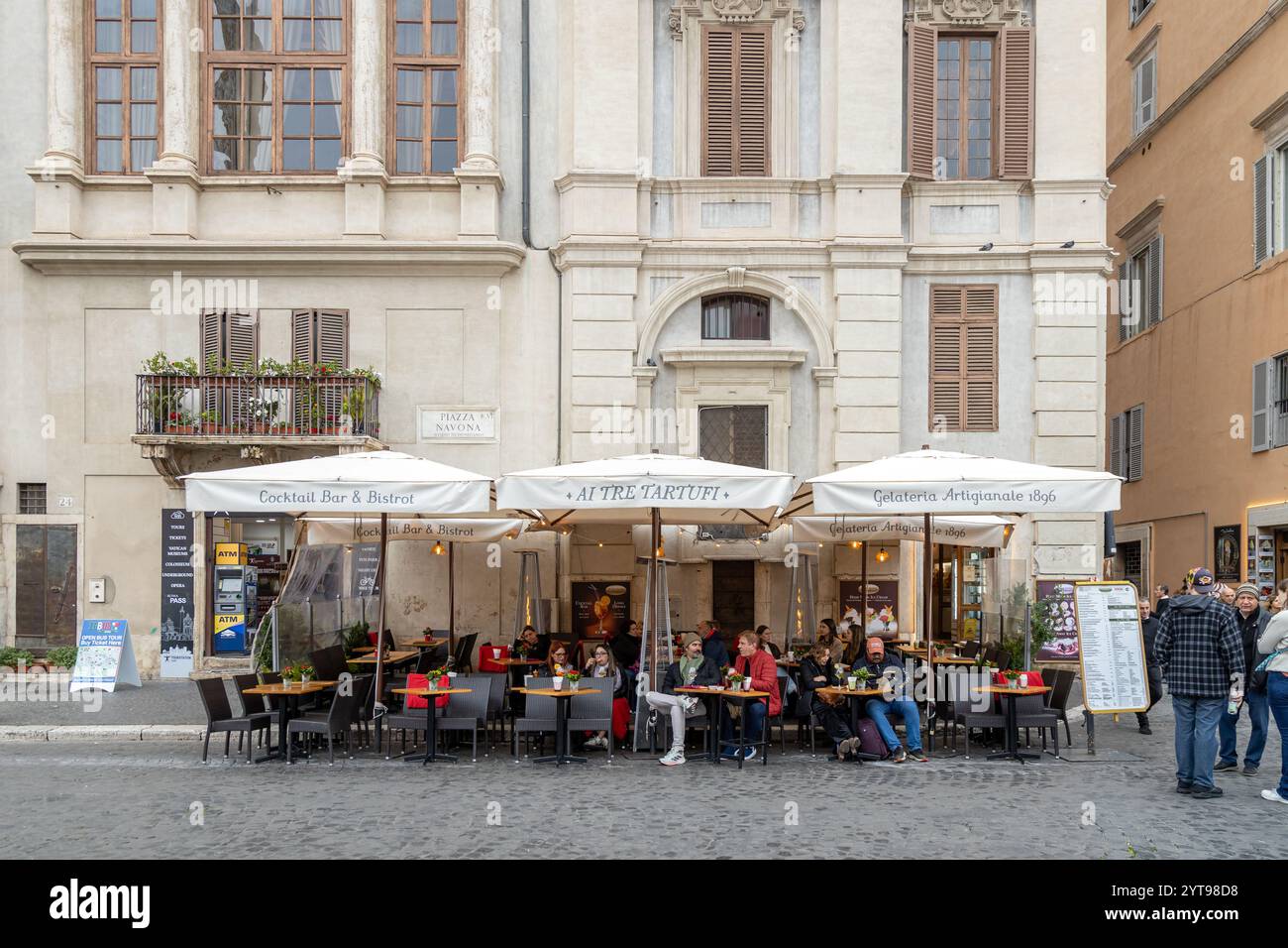 Rome, Italy - Nov 14th, 2024: People enjoying outdoor seating at a ...