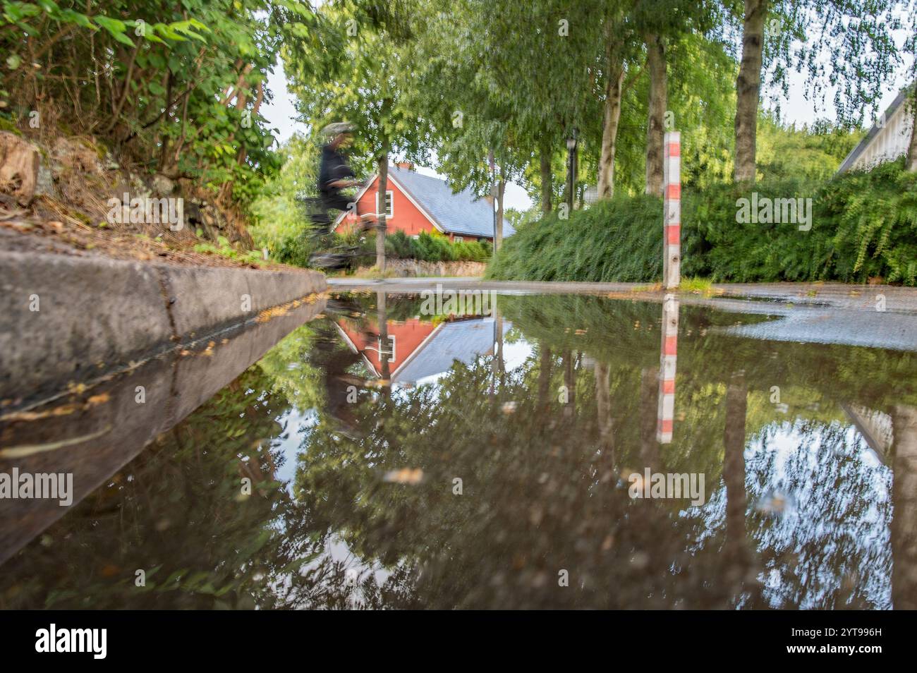 Puddle reflection road street hi-res stock photography and images - Alamy