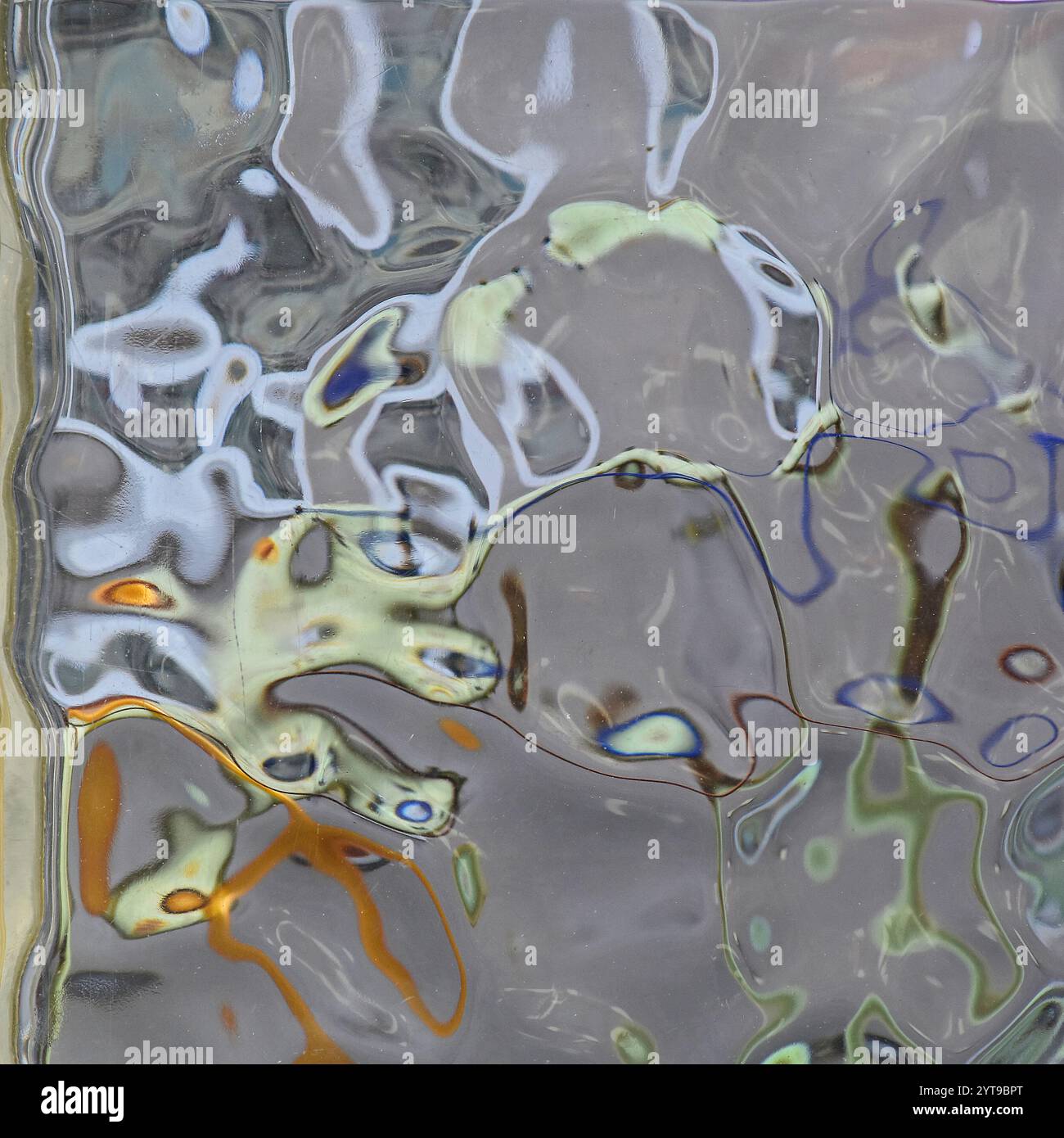 Colorful reflections in a glass block Stock Photo - Alamy