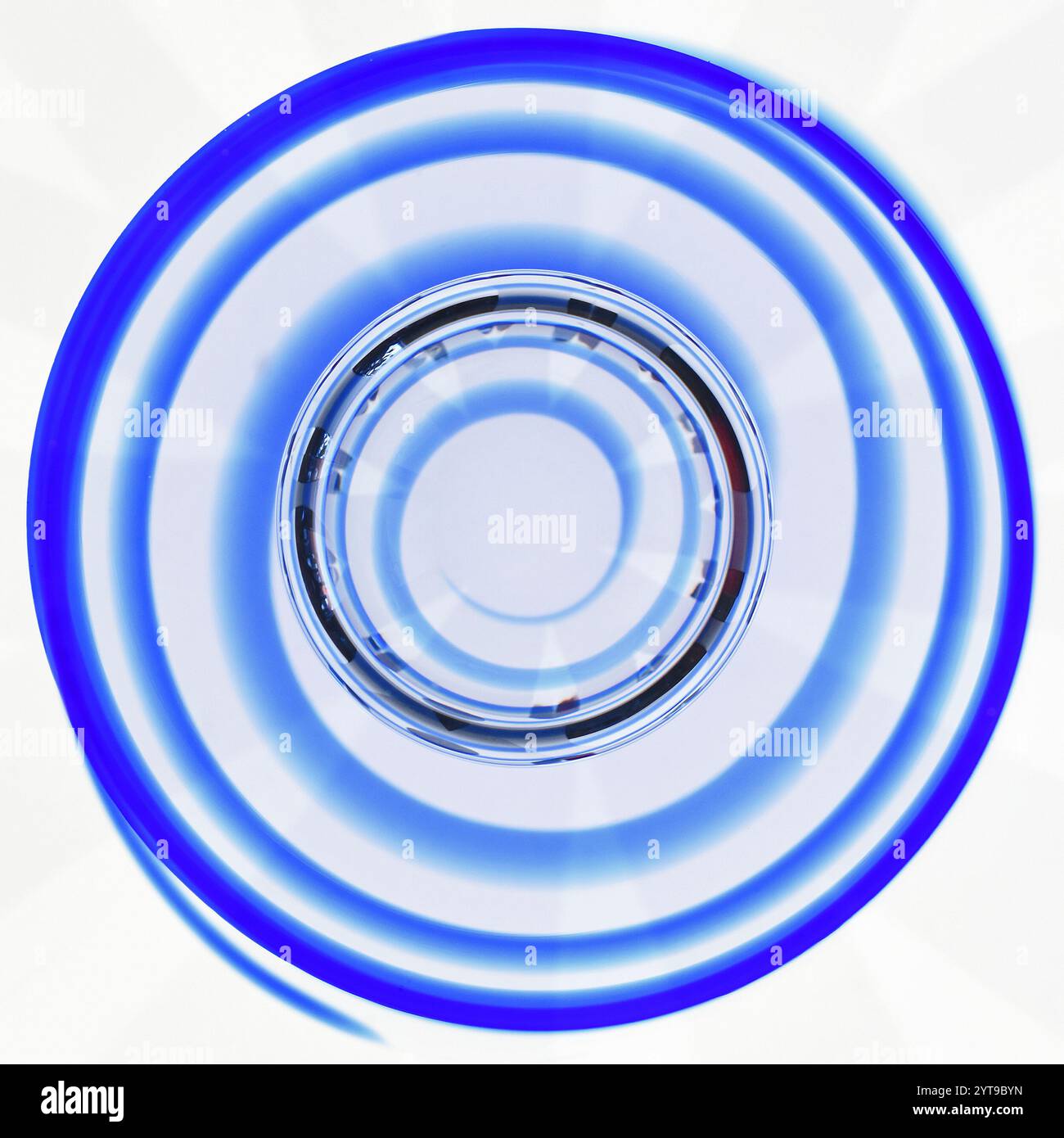 Spiral of blue glass threads in a glass object Stock Photo - Alamy