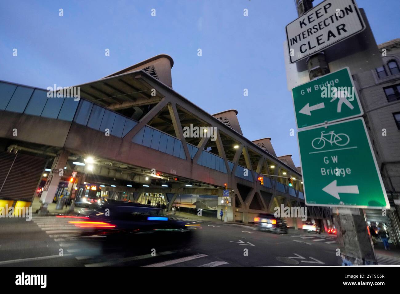 Traffic rolls past the George Washington Bridge Bus Station in New York ...