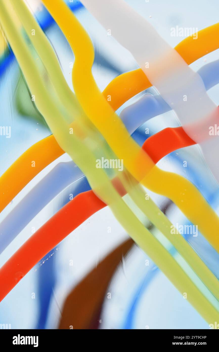 Colorful glass threads in a glass object Stock Photo - Alamy