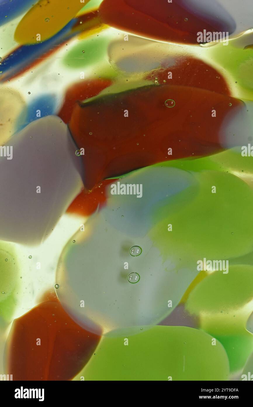 Air bubbles in a colorful glass object Stock Photo - Alamy