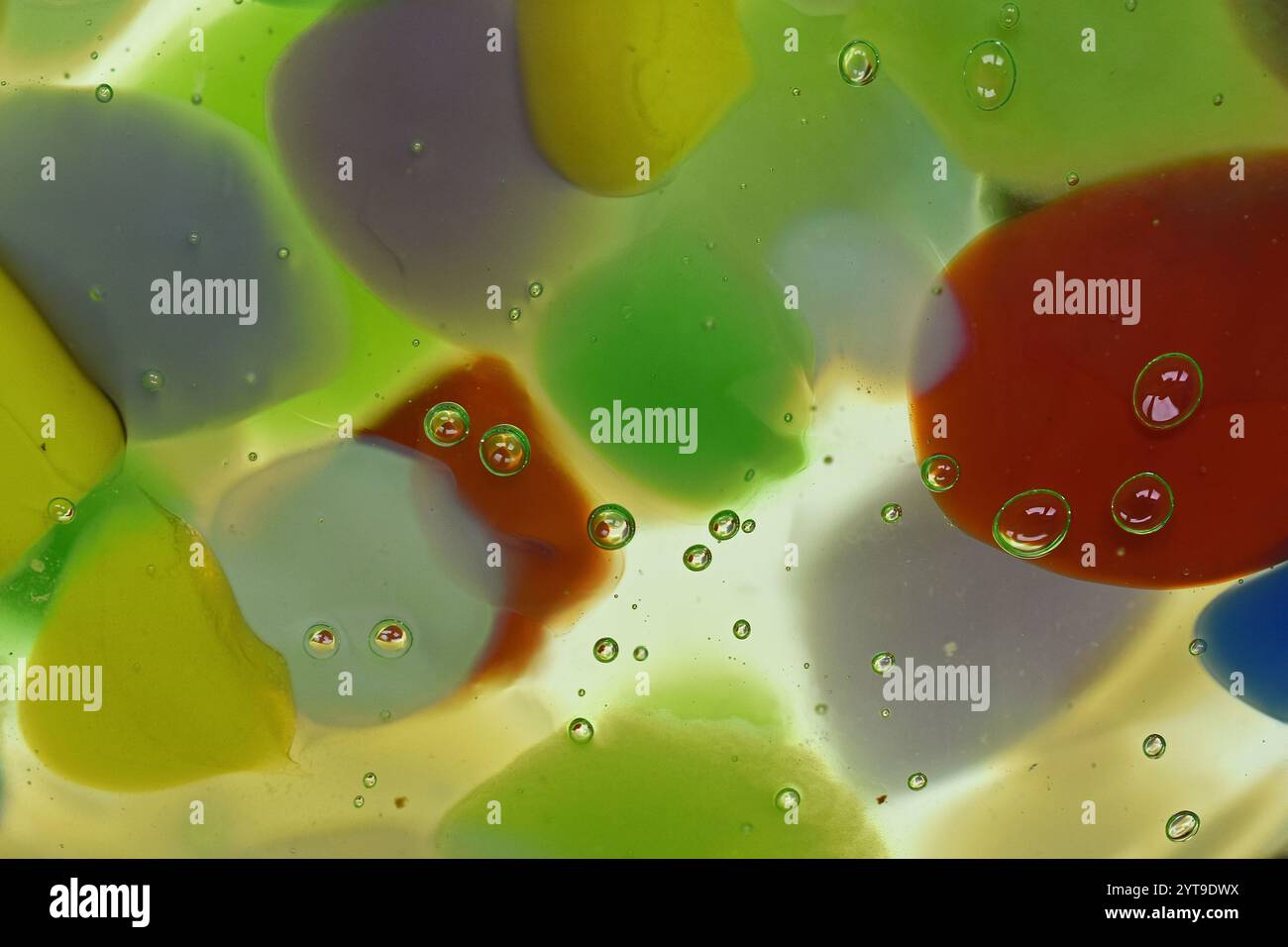 Air bubbles in a colorful glass object Stock Photo - Alamy