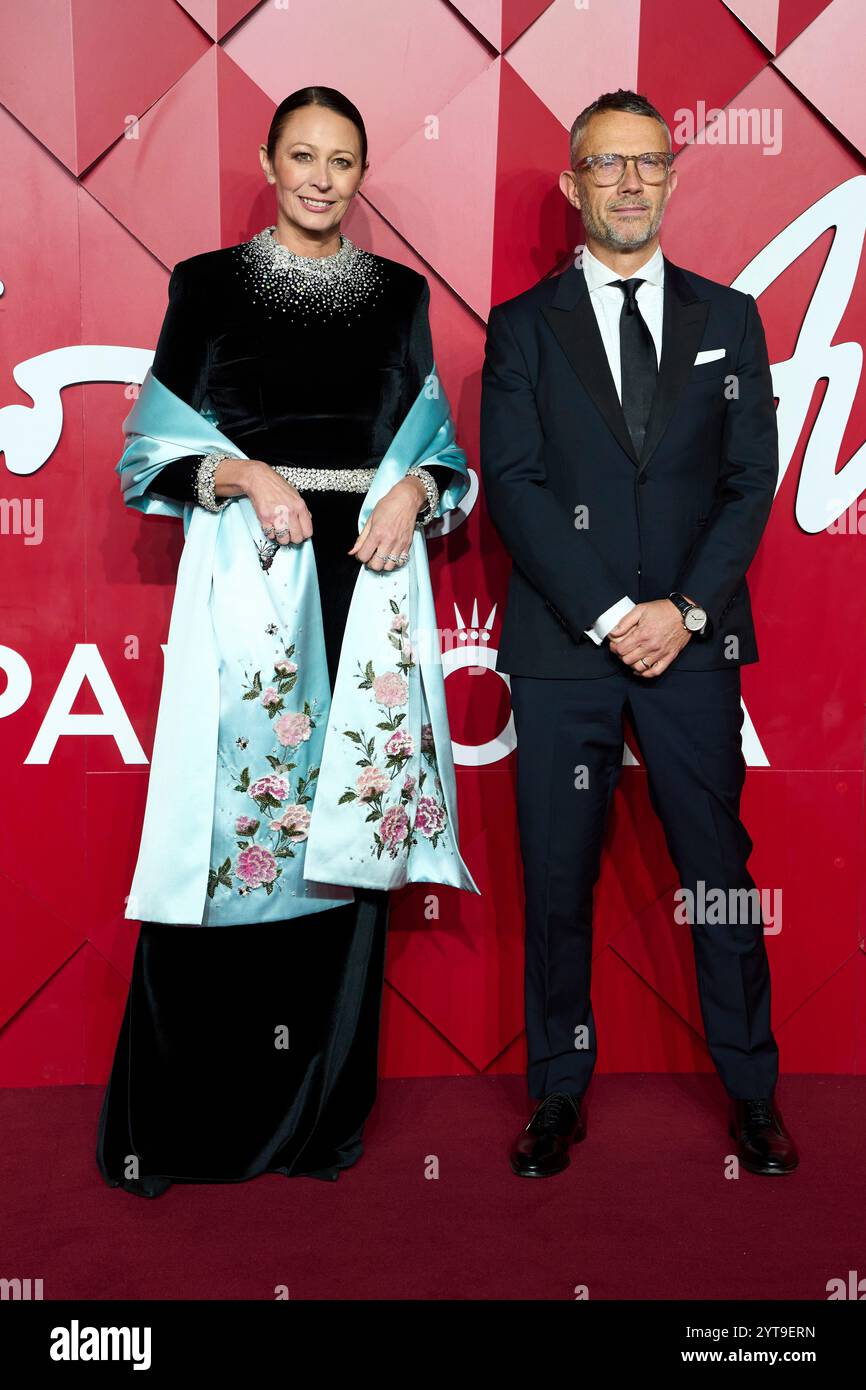 Caroline Rush, left, and David Pemsel pose for photographers upon ...