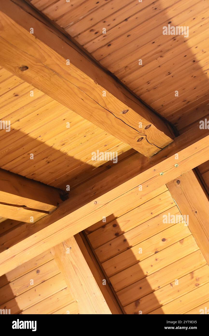 The interplay of light and shadow on a ceiling construction Stock Photo ...