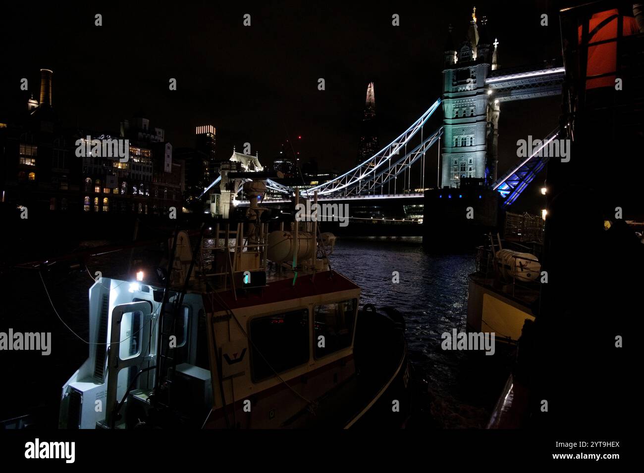Pilot boat near Tower Bridge, London at night - 30th September 2024 ...