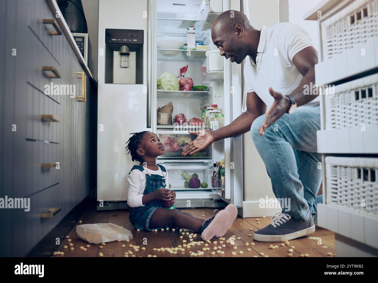 Curious toddler sitting on kitchen hi-res stock photography and images ...