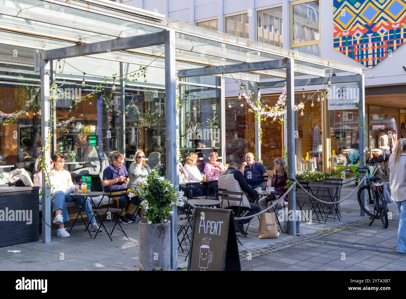 Lillehammer,Norway, people socialising and enjoying a drink at a ...