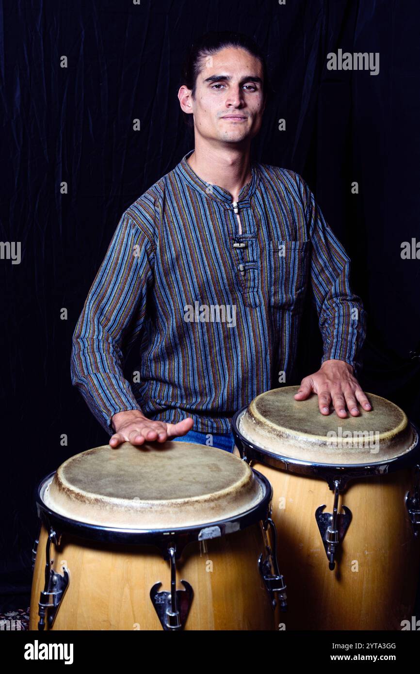 Playing conga drums hi-res stock photography and images - Alamy