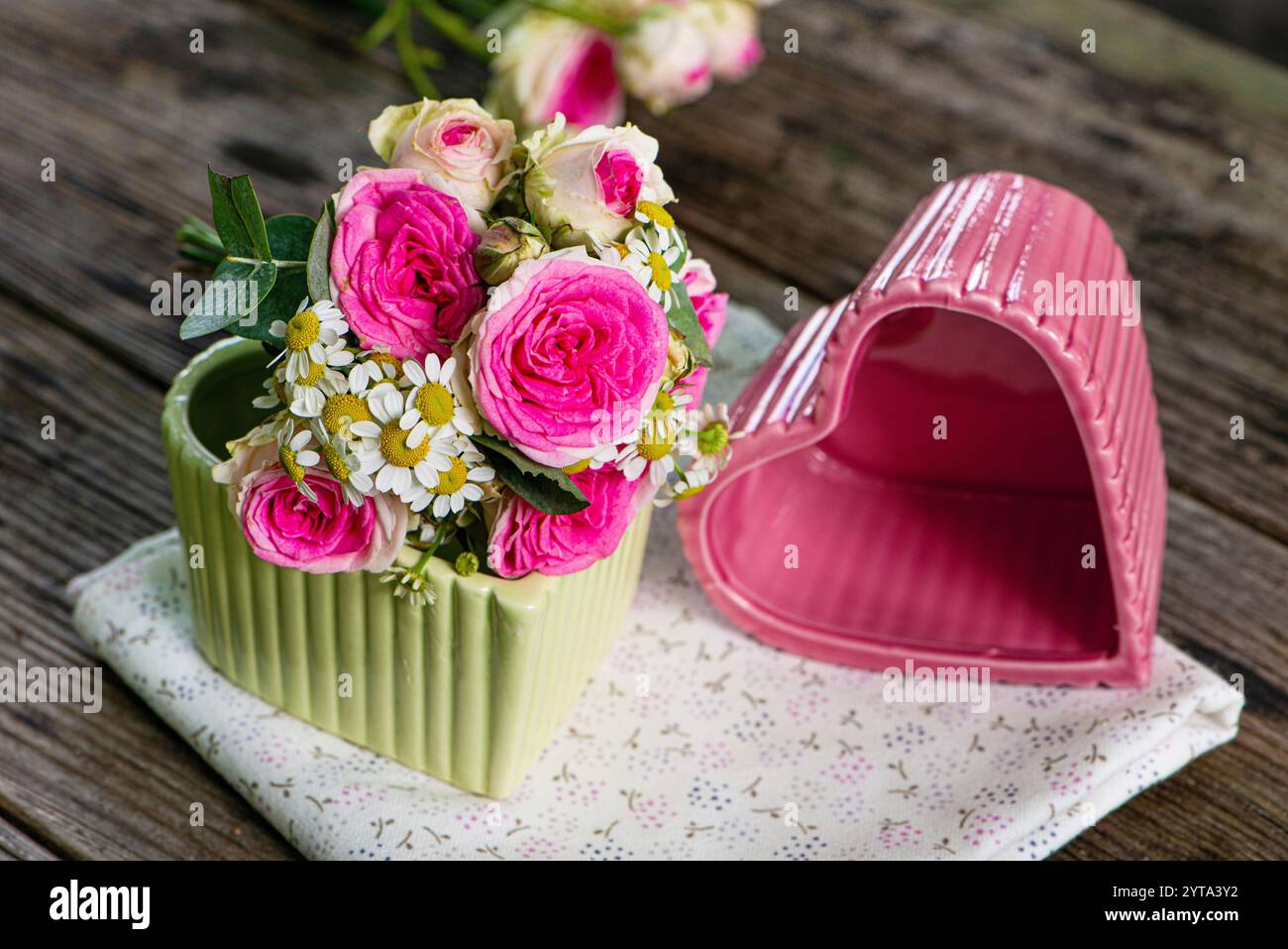 Hearts with roses hi-res stock photography and images - Alamy