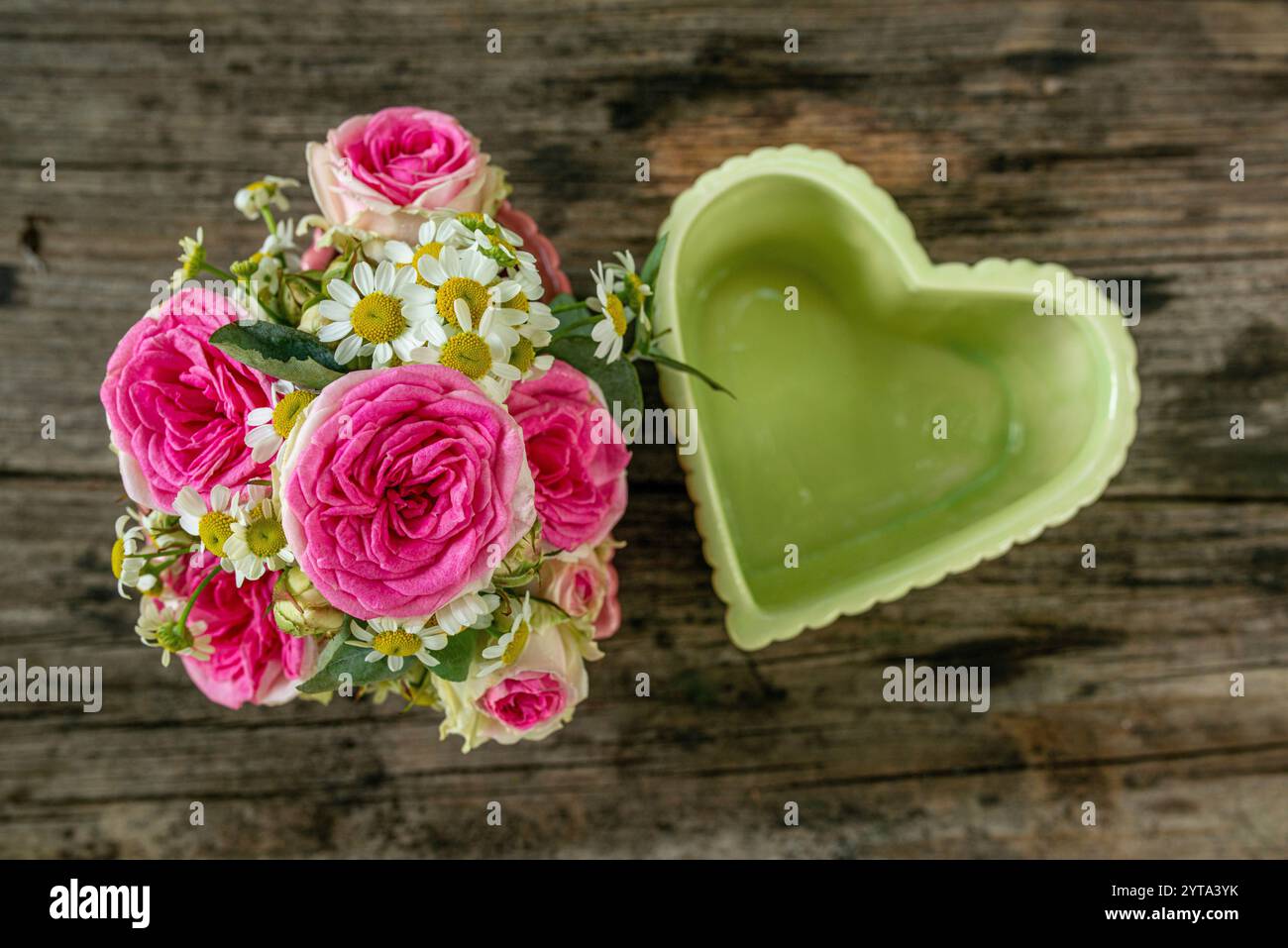 Hearts with roses hi-res stock photography and images - Alamy