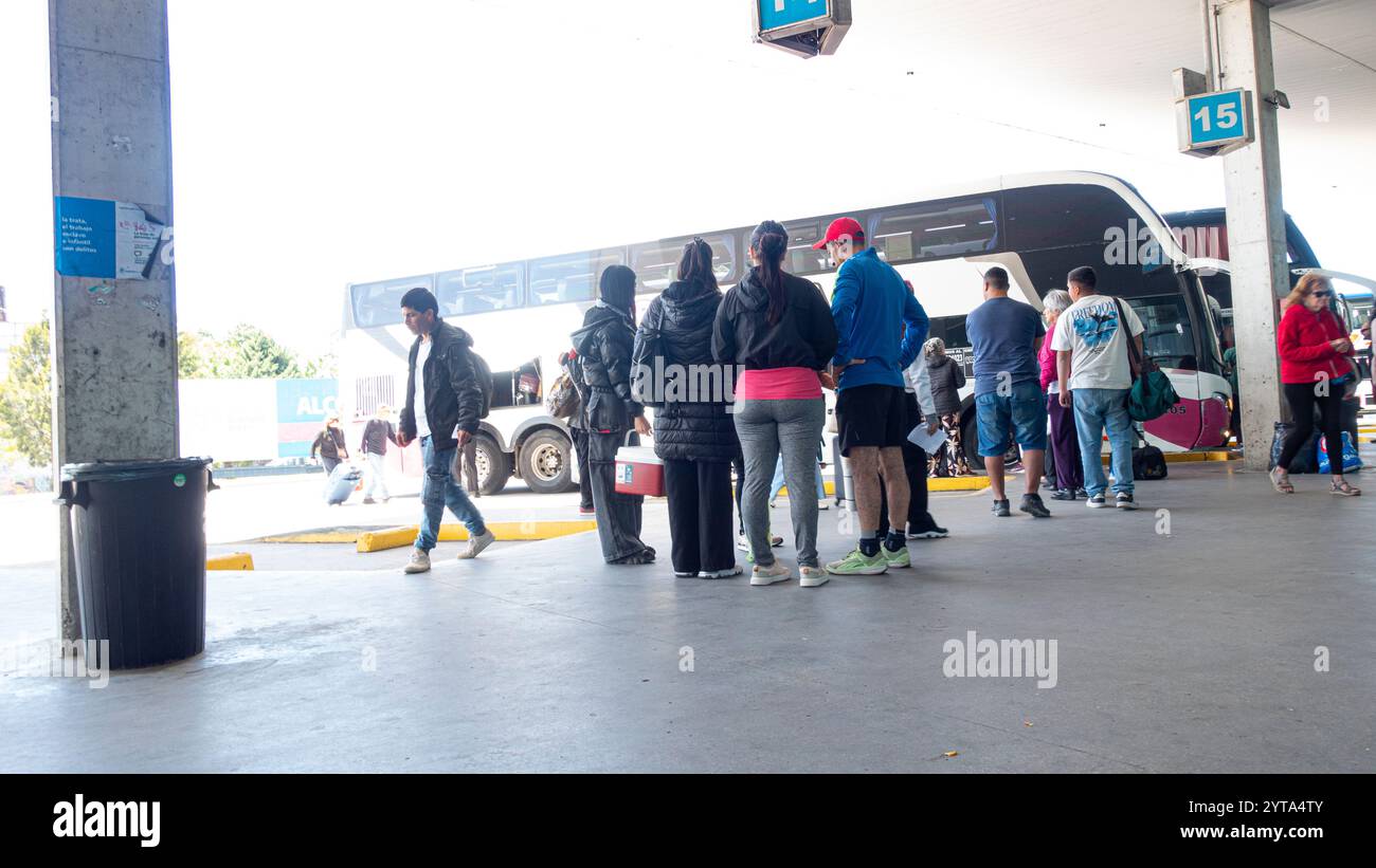 Central bus station People embarking in buses Stock Photo - Alamy