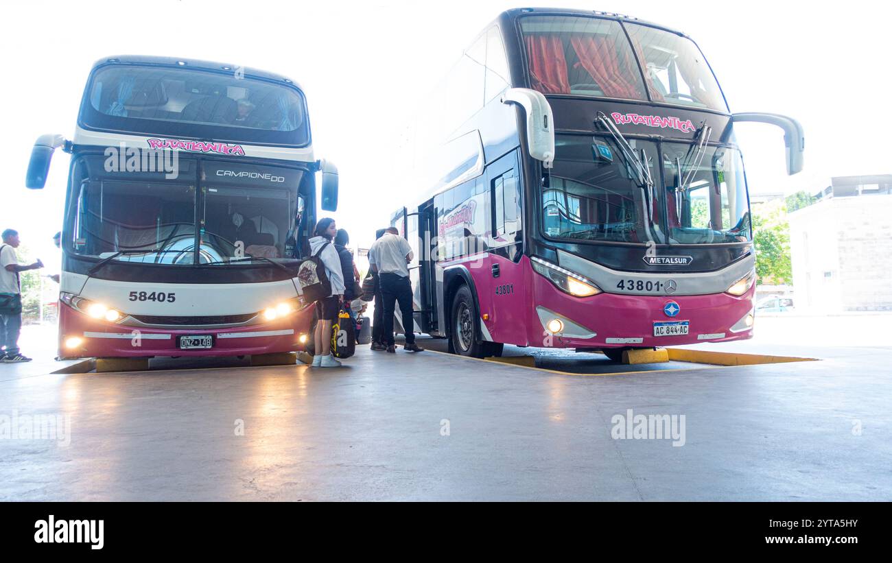 Long distance bus station and buses at the platform Stock Photo - Alamy