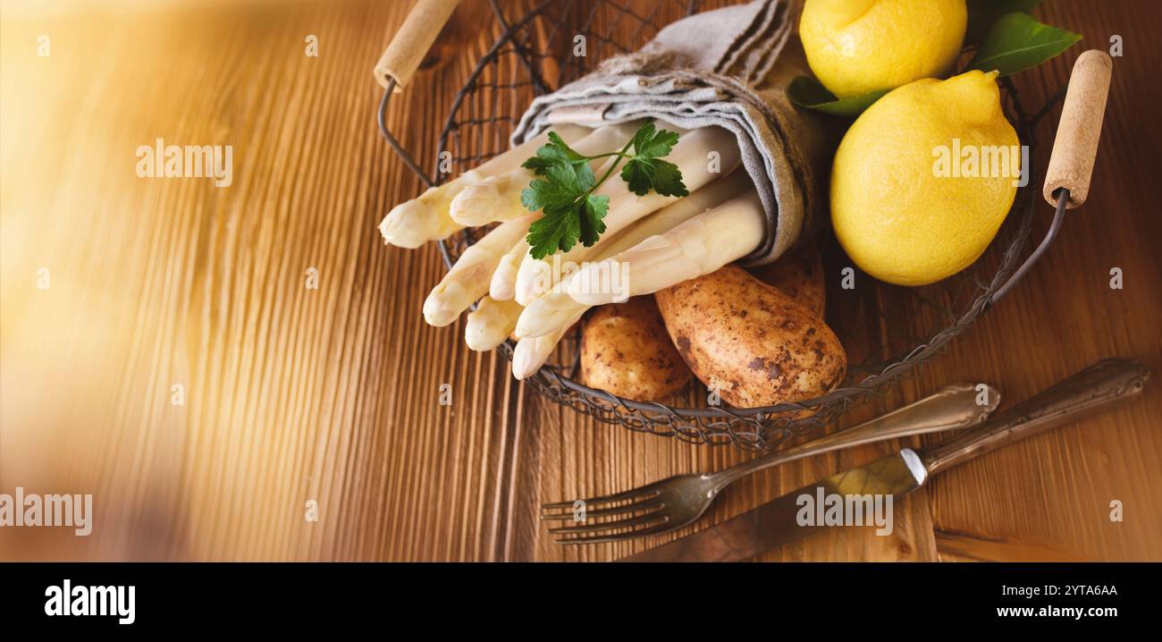 Seasonal fresh white asparagus. Spring vegetables with ingredients for ...