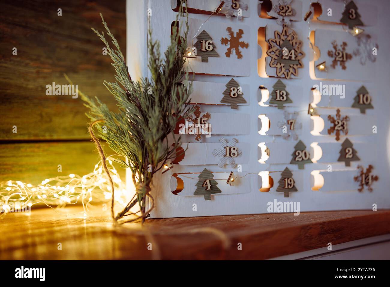 Christmas decoration with illuminated advent calendar and string light ...