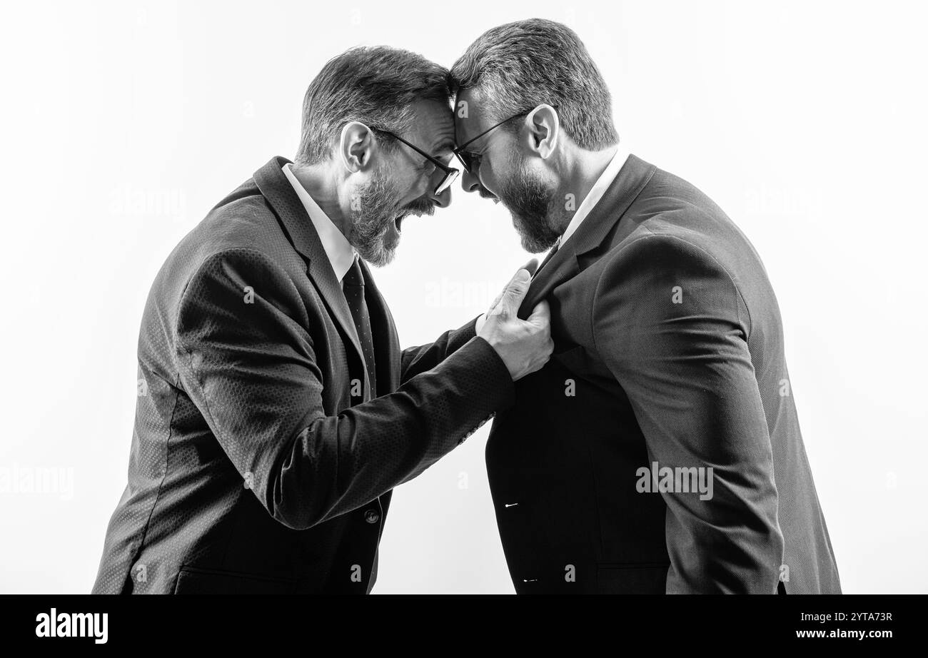 two businessmen fighting at rivalry isolated on white. unethical ...
