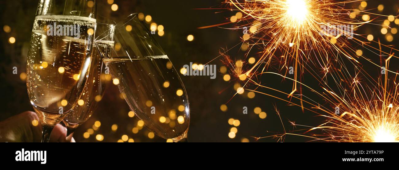 Toasting champagne for festive celebrations. Glasses of sparkling wine ...