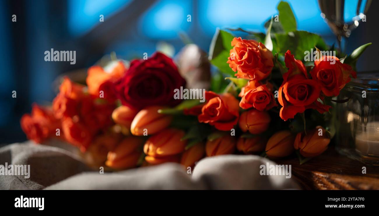 Romantic flower still life with red roses and tulips. Background with ...