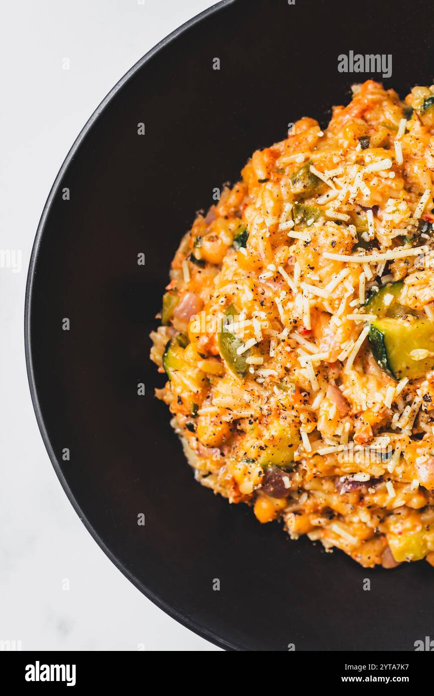 risoni with Mediterranean vegetables and creamy tomato sauce topped ...