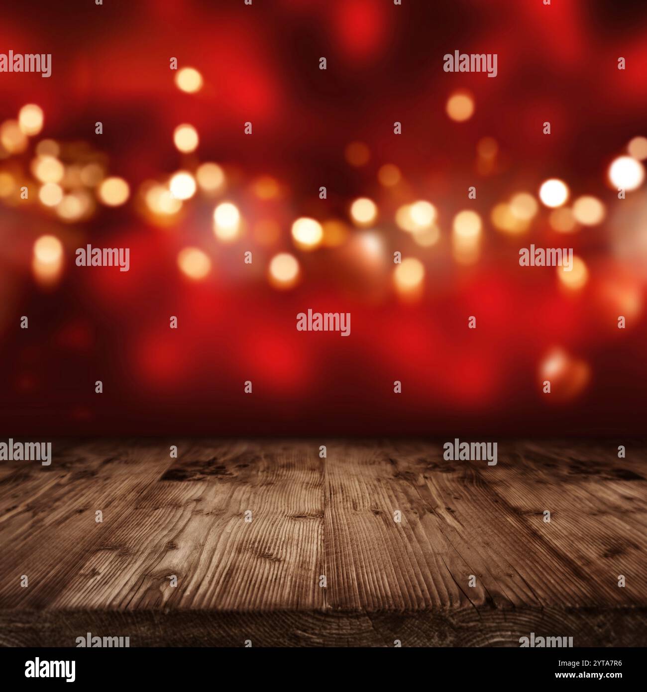 Luminous red christmas background with golden lights in front of an ...