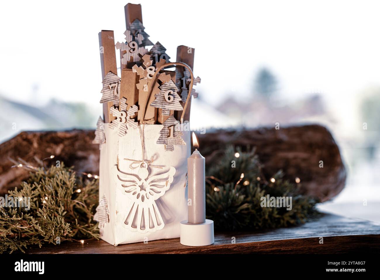 Homemade advent calendar made of cardboard. Small cardboard boxes in a ...