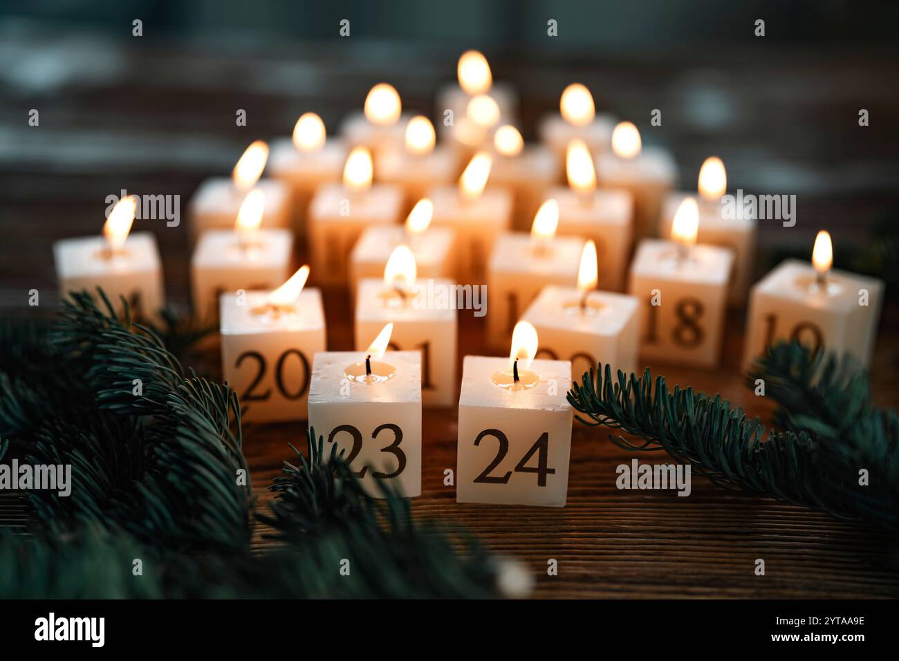 Advent calendar made of twenty four burning candles. Homemade candles ...