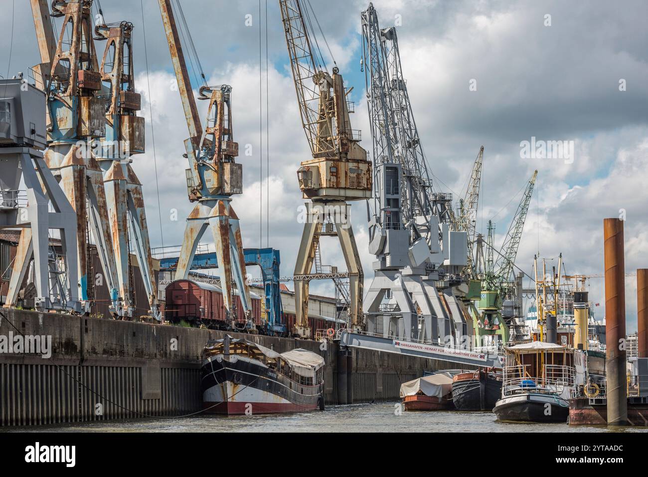 Historic harbor cranes at the German Harbor Museum in the Hansa Harbor ...
