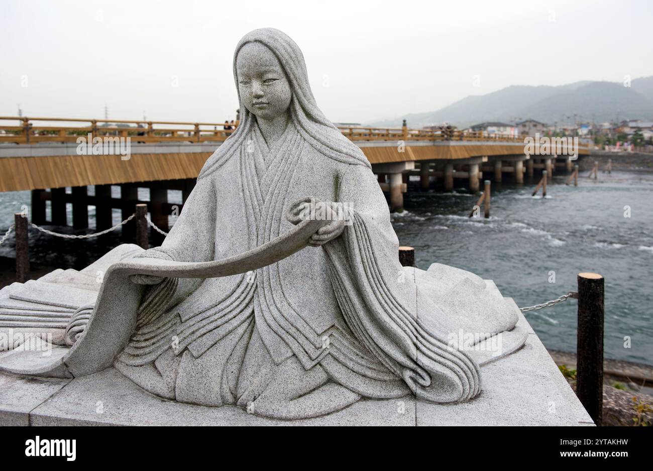 Stone statue of the famous Heian Period female poet and writer Murasaki Shikibu who wrote the ...