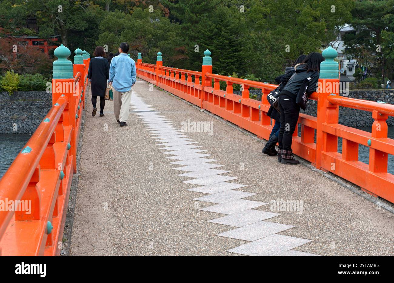 People crossing the Asagiri Bridge over the Uji River in Uji, Kyoto ...