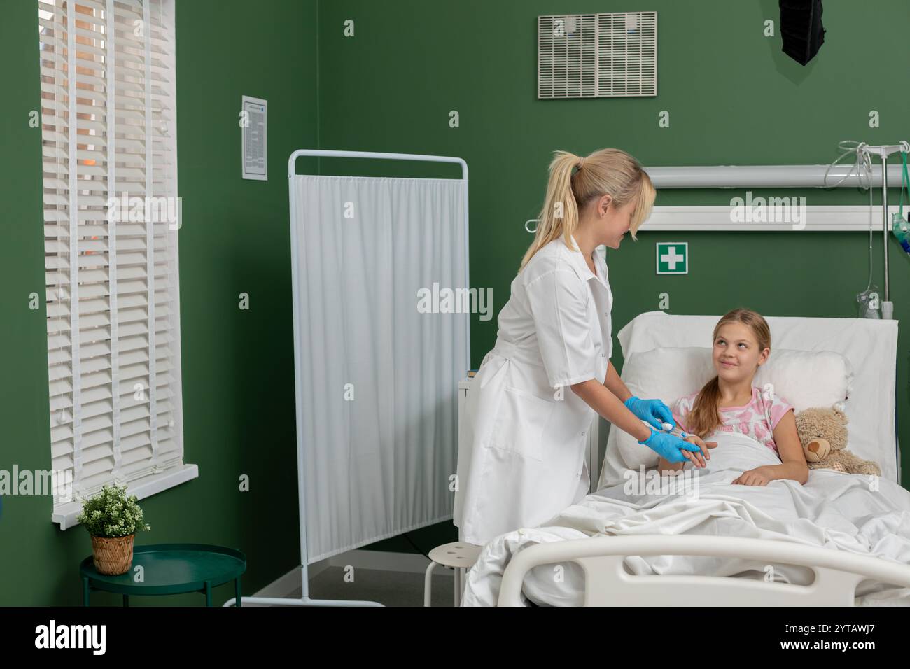 Nurse Providing Compassionate Care for Child Patient in Hospital Room Environment Stock Photo ...