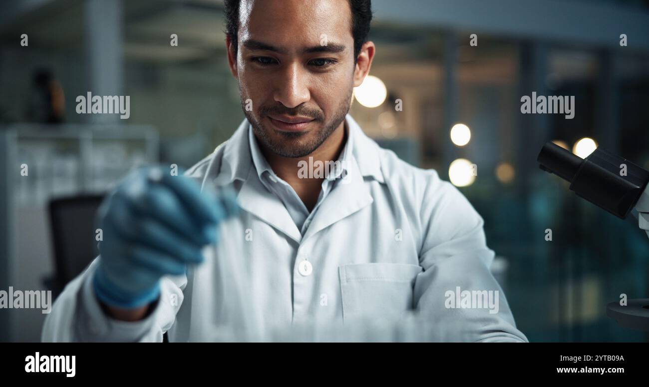 Scientist, man and test tube by microscope in lab with chemical, check ...