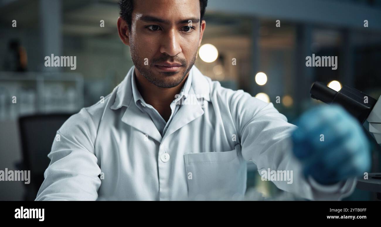 Scientist, man and film for microscope in lab with chemical reaction ...