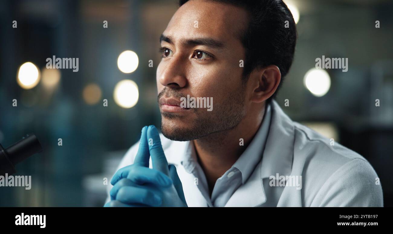 Scientist, man and thinking at night in laboratory for problem solving ...